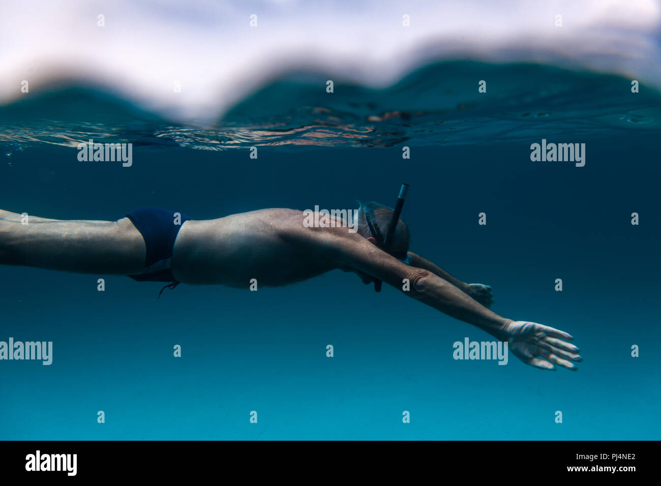 Old man swimming floating in hi-res stock photography and images - Alamy