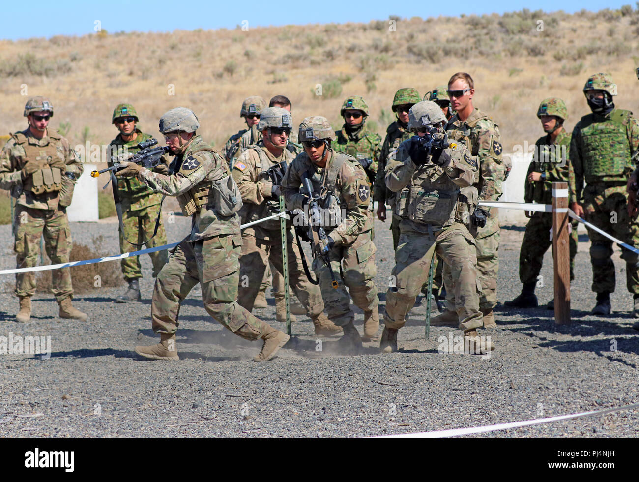 American Soldiers from 1st Battalion, 17th Infantry Regiment, along ...
