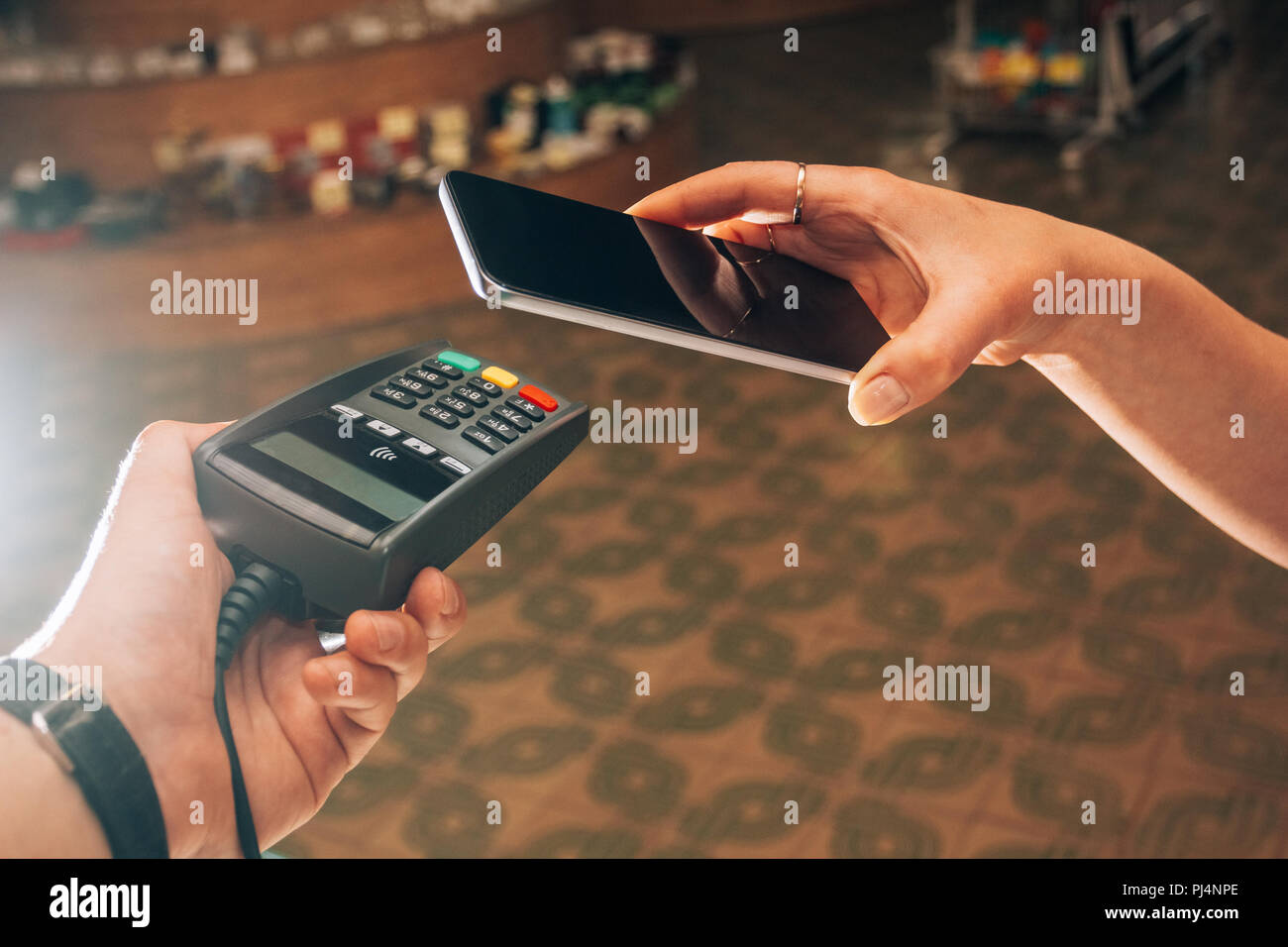 The Wireless payment system smartphone with NFC Stock Photo - Alamy