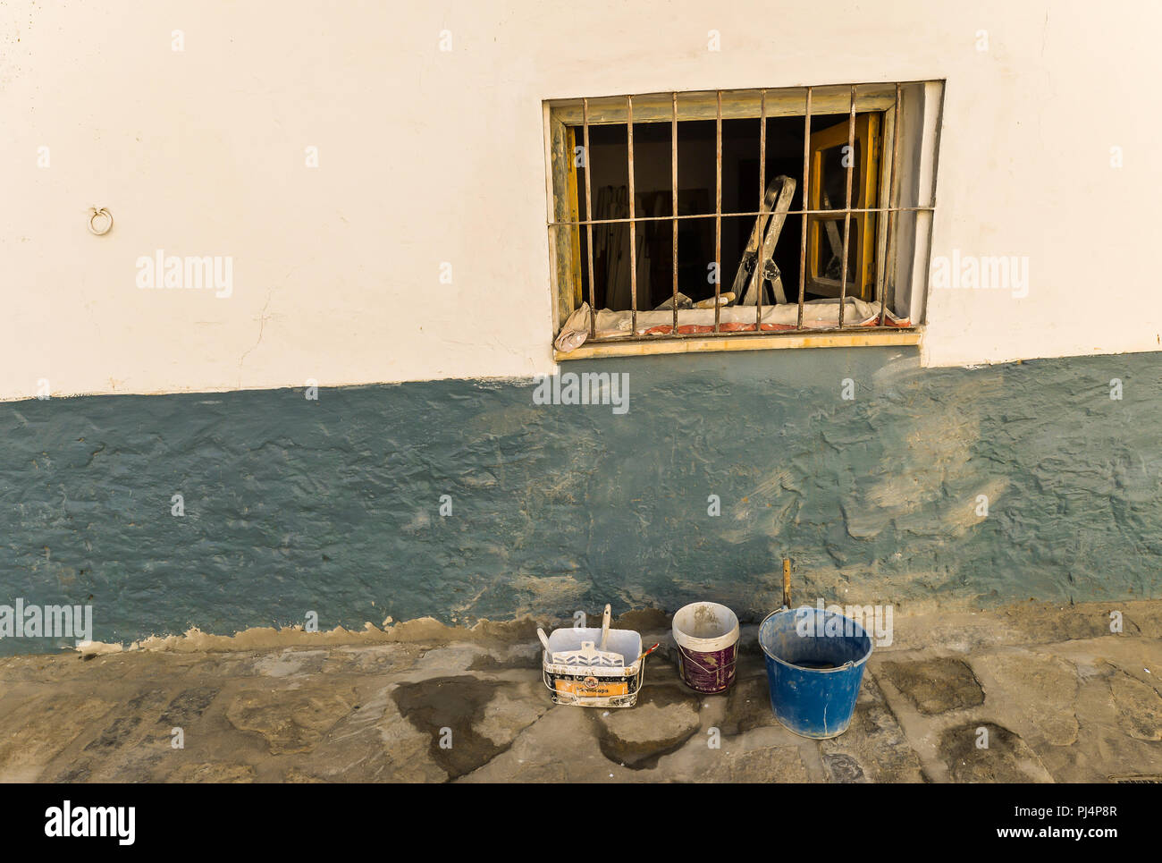 Tools and buckets in Ronda - Spain Stock Photo - Alamy