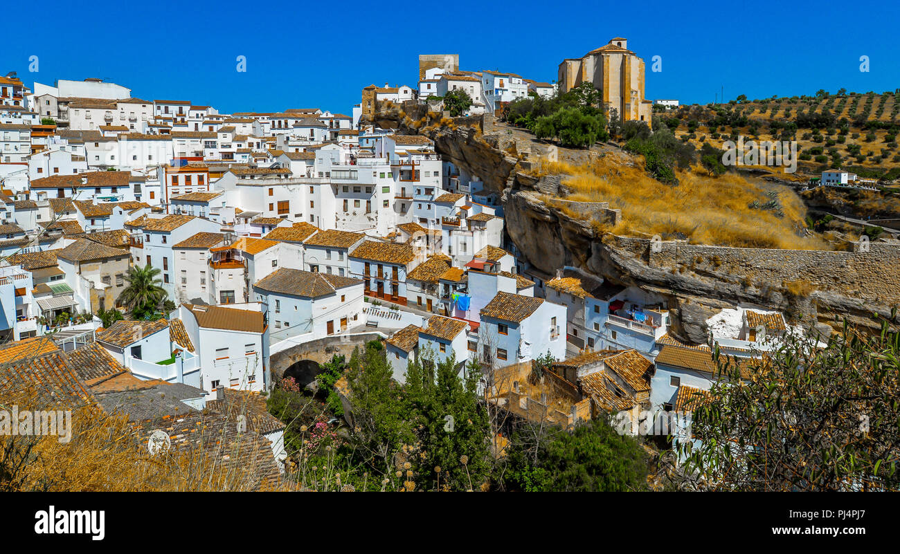 The Andalucian village near Ronda that is built in the surrounding ...