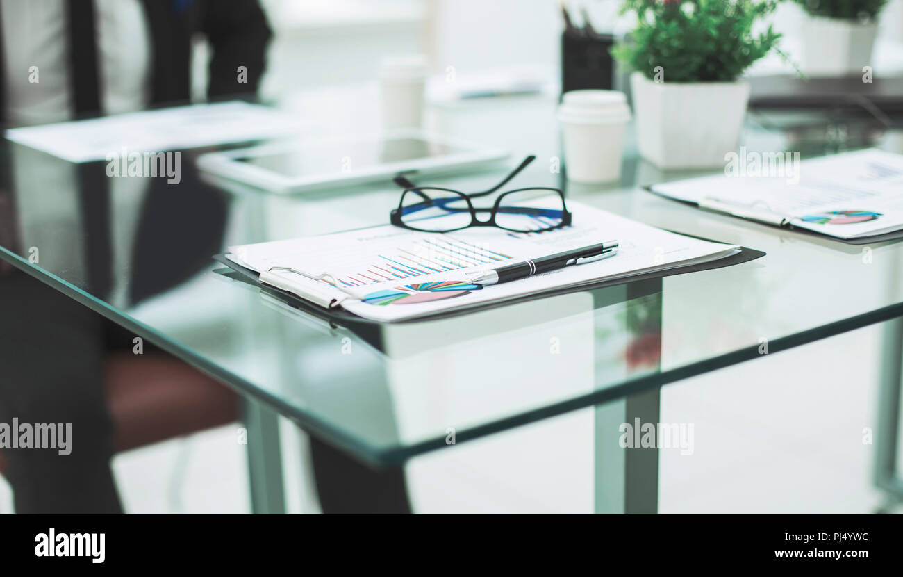financial charts on the table before business meeting Stock Photo - Alamy
