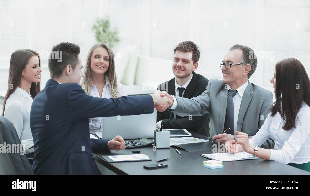 business partners shaking hands after a successful transaction Stock ...