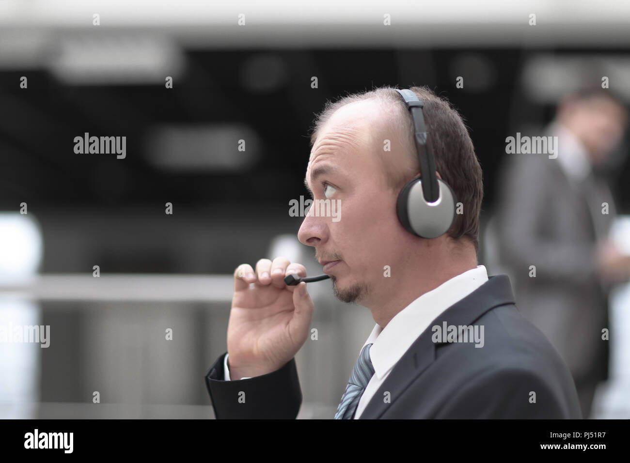 portrait operator call center on blurred background Stock Photo - Alamy