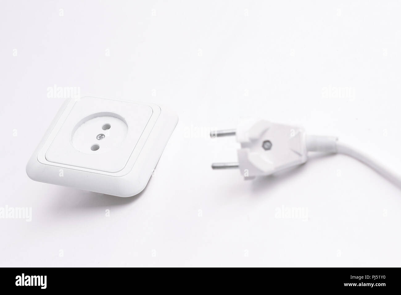electrical outlet and plug.isolated on a white background Stock Photo ...