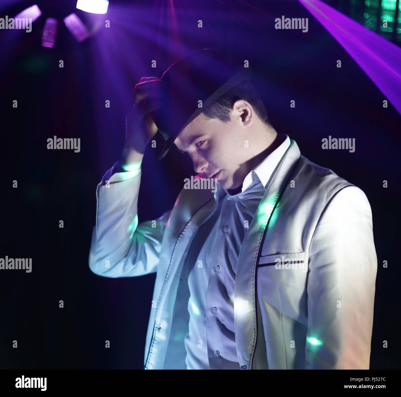 stylish man DJ at a nightclub party .photo with copy space Stock Photo ...