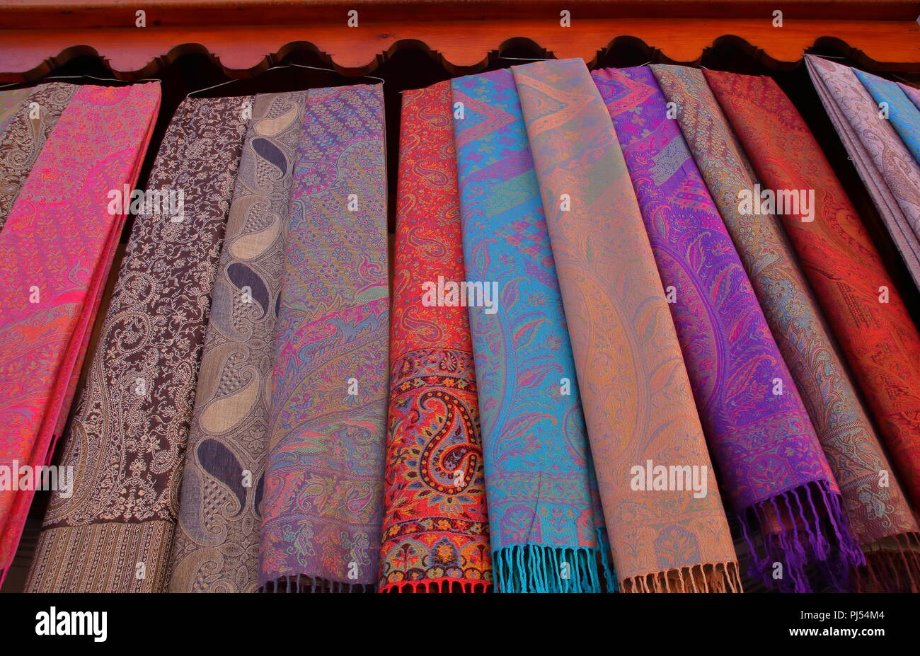 Colorful scarves made of wool and silk with traditional, typical ...