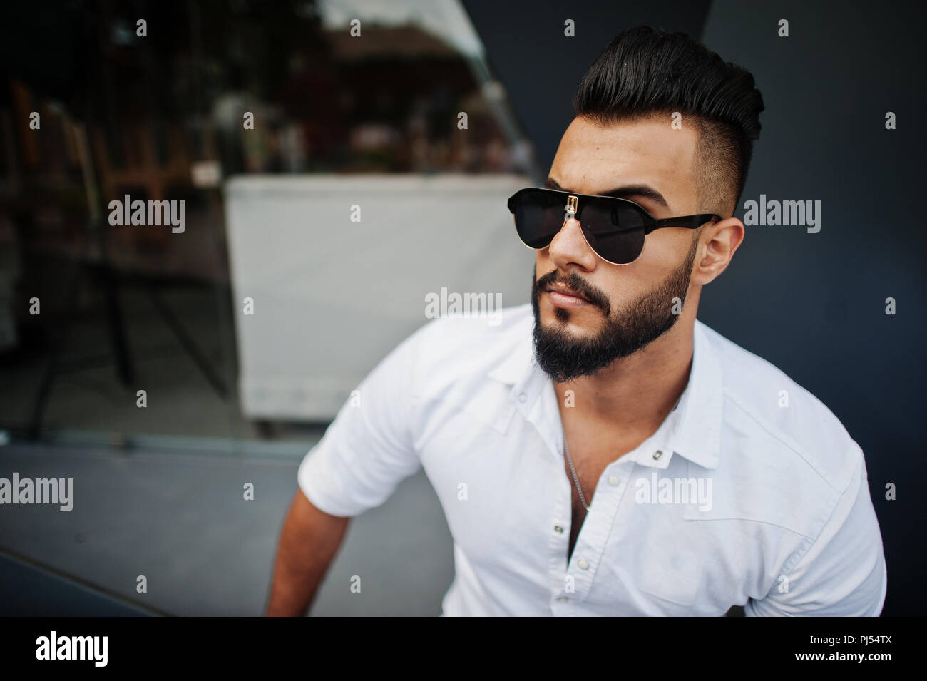 Close up photo of stylish arabian man model in white shirt and ...