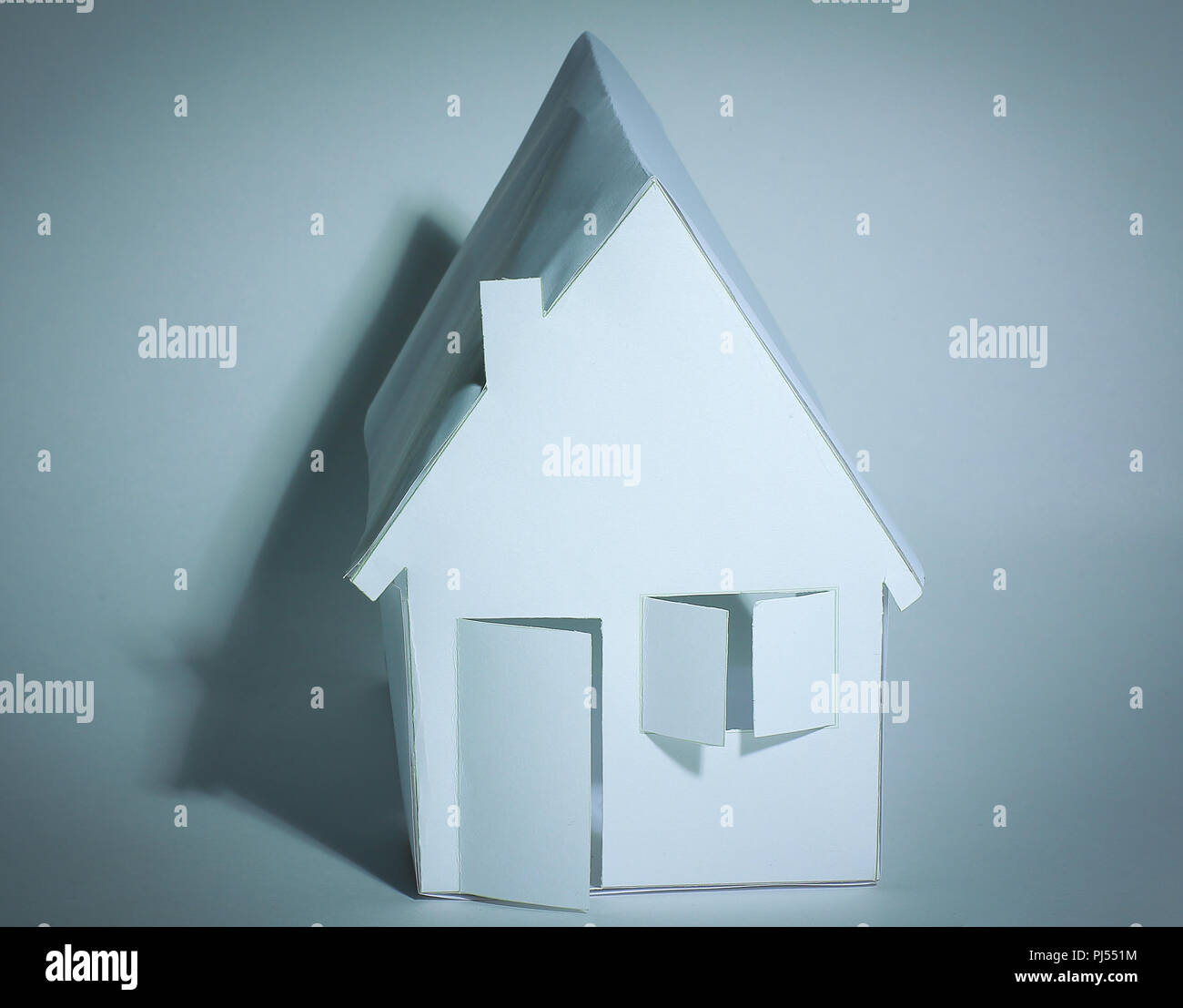 cardboard man on a paper background. background Stock Photo - Alamy