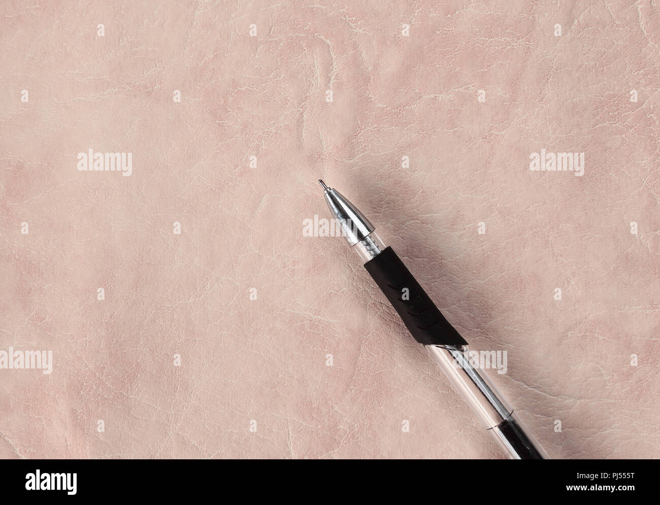 pen on textured paper.large space for text Stock Photo - Alamy