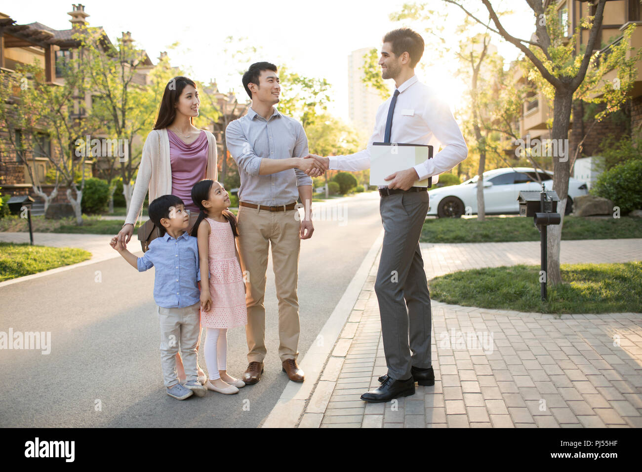 Asian american businessman greeting hi-res stock photography and images ...