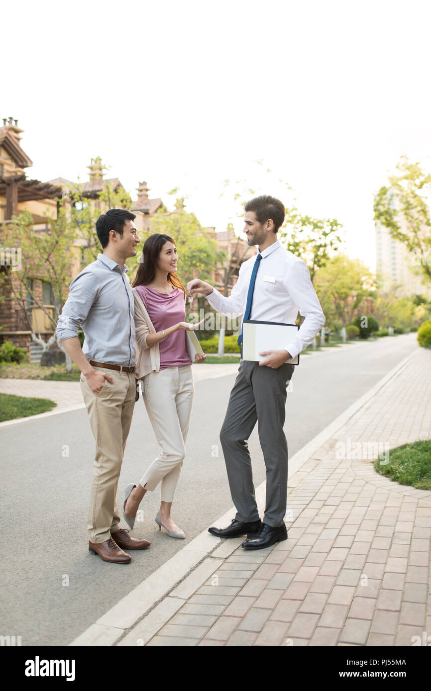 Professional couple couple luxury house hi-res stock photography and ...