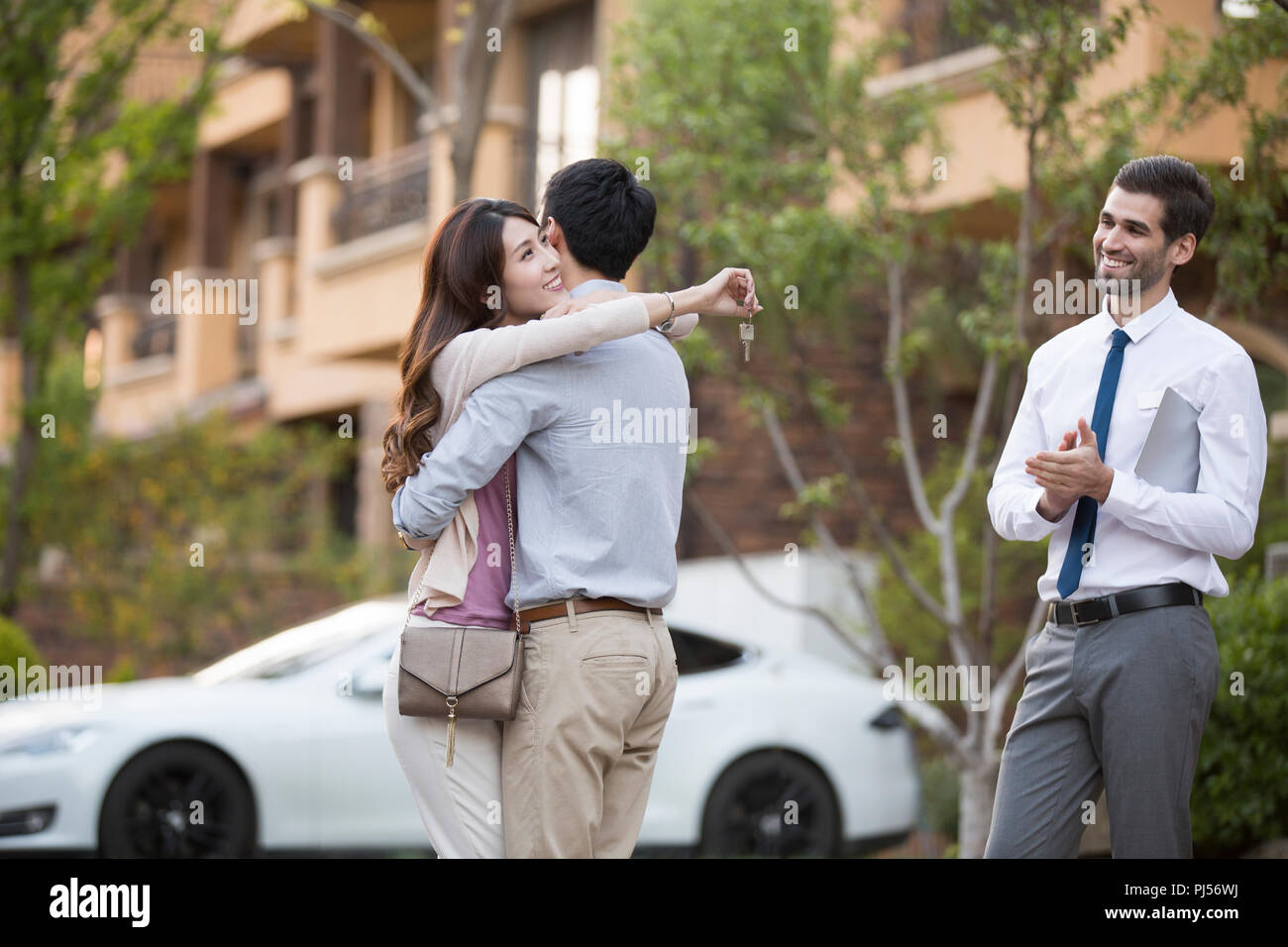 Professional couple couple luxury house hi-res stock photography and ...