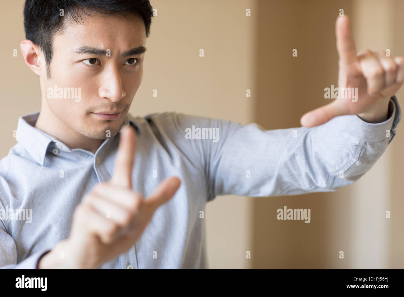 Young man designing home renovation Stock Photo - Alamy