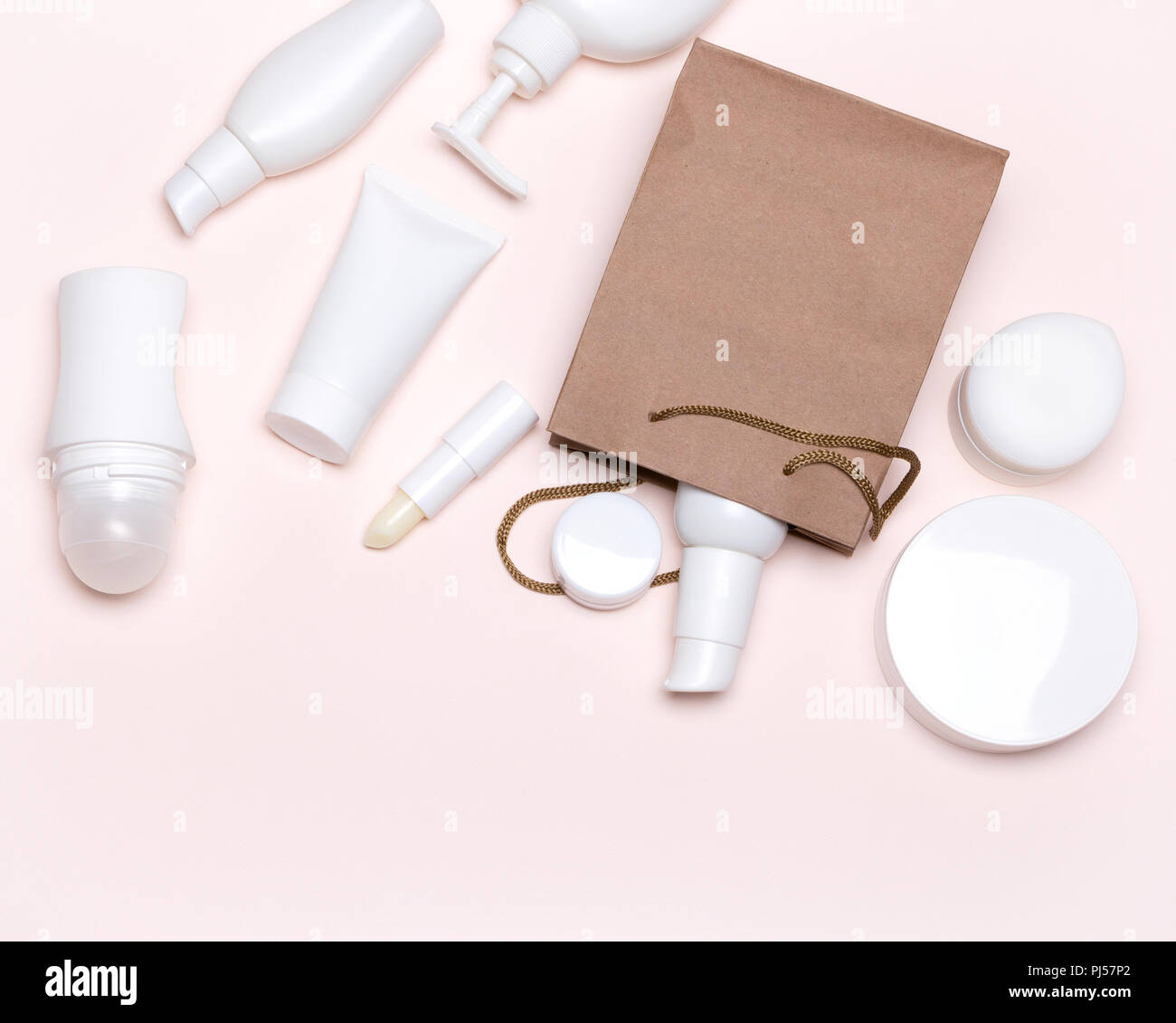 Cosmetic products with paper packaging bag. Beauty shopping concept ...