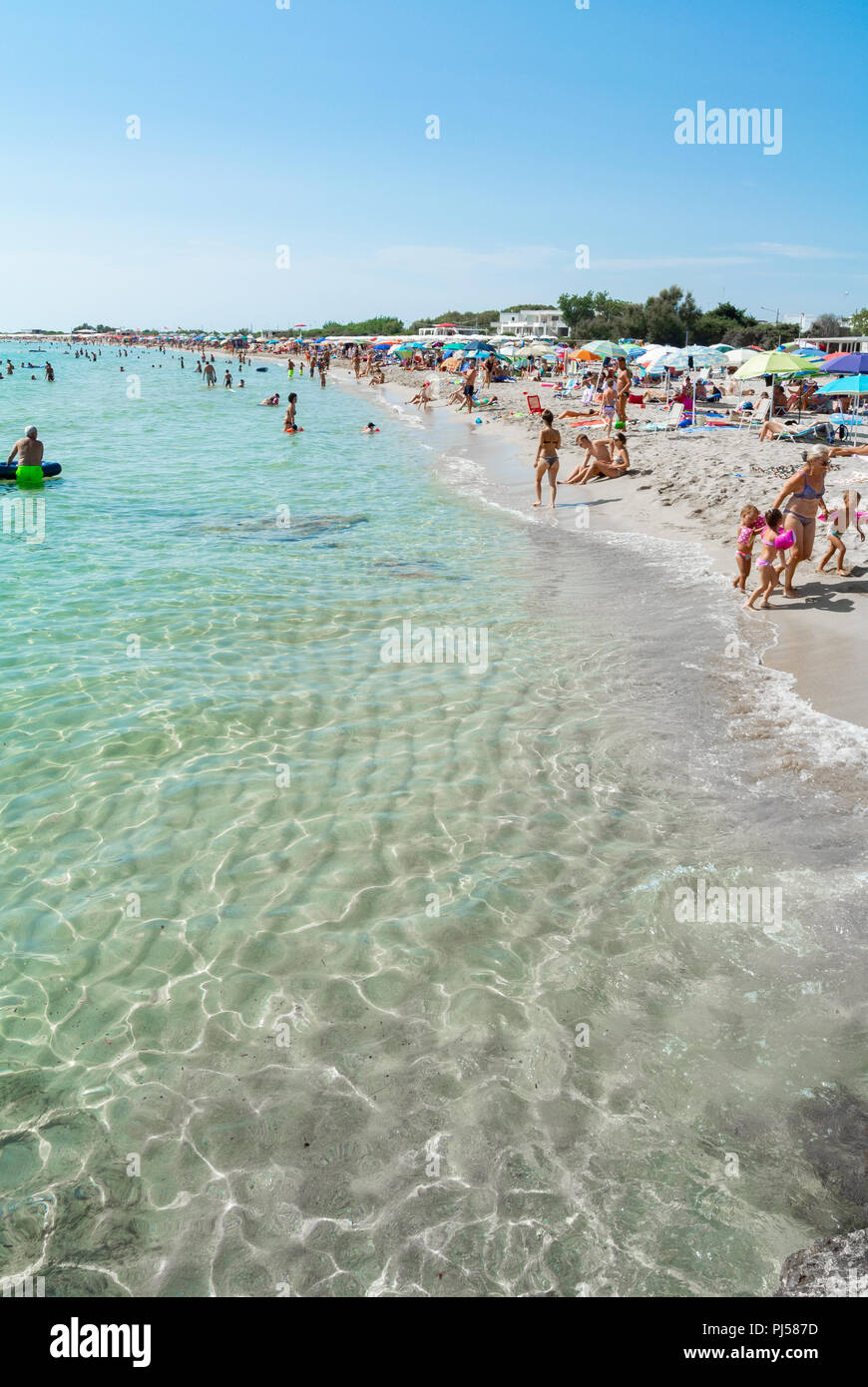 Italian people on a public beach of Lido Marini, Lecce, puglia, Italy ...