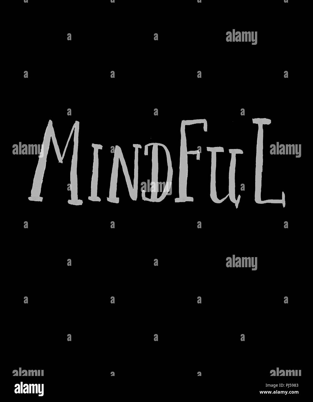 The word mindful handlettered handwritten graphic on a black background ...