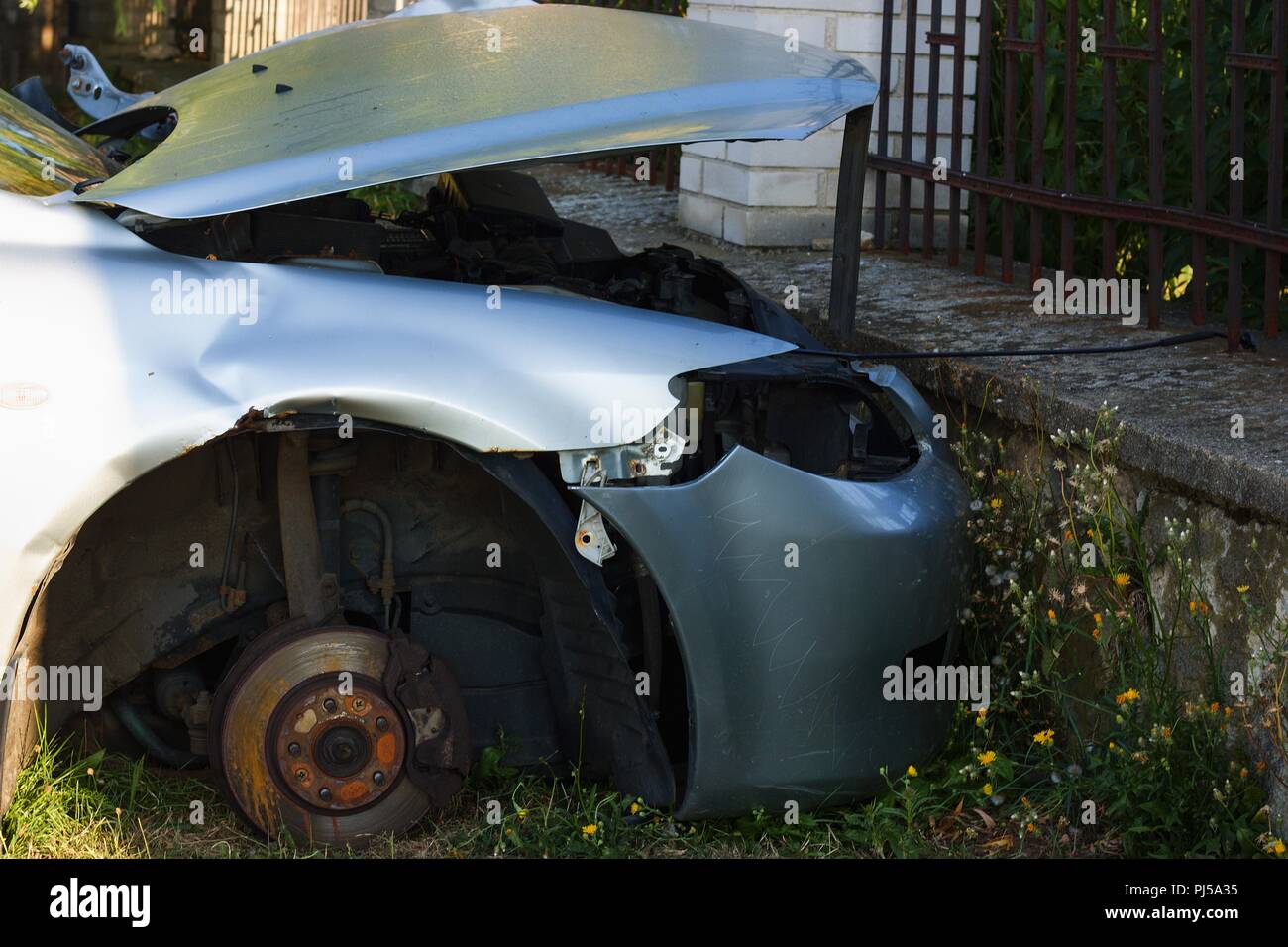 Side view of real life car accident. Car crashed into the wall Stock ...
