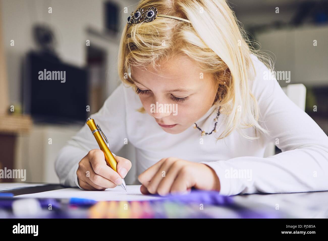 Children writing exam hi-res stock photography and images - Alamy