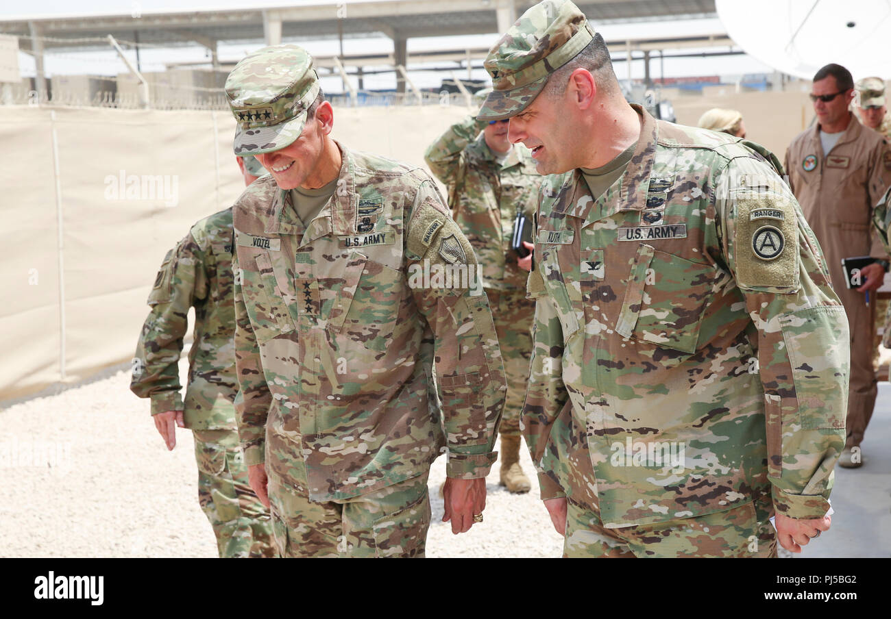 U.S. Army Gen. Joseph Votel, U.S. Central Command commander, shares a ...