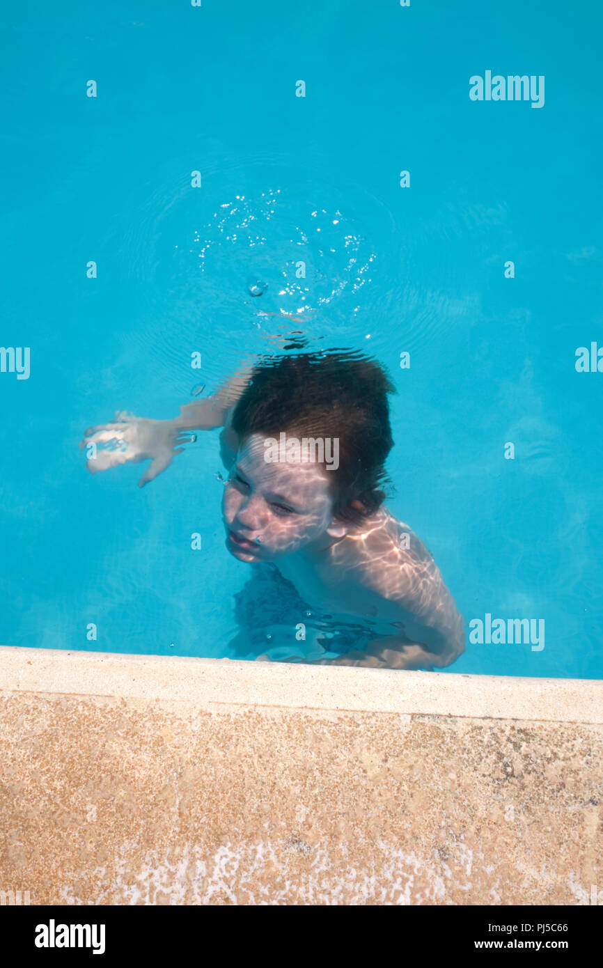 Boy sinking underwater in swimming hi-res stock photography and images ...