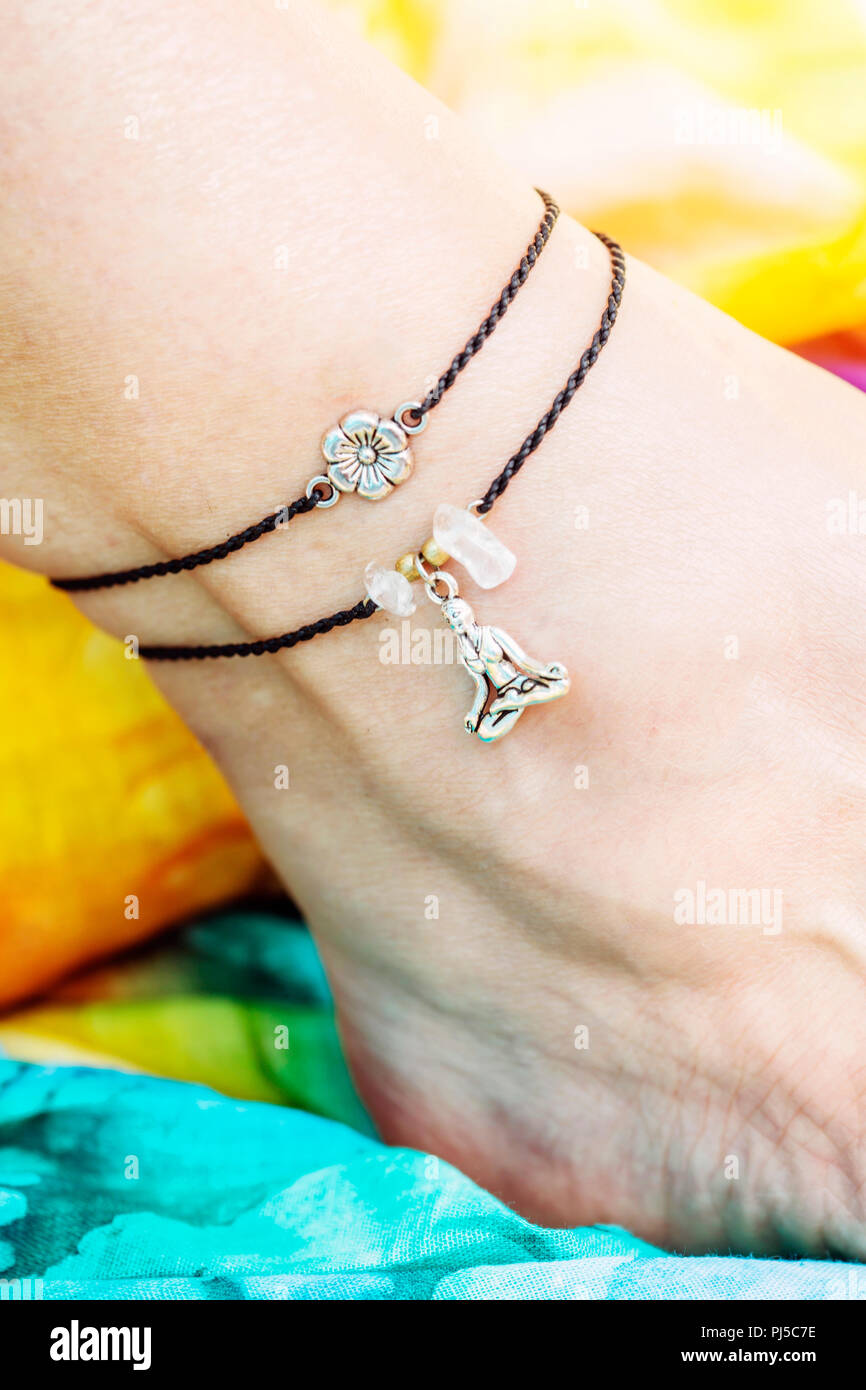 Ankle bracelet or ankle string hi-res stock photography and images - Alamy