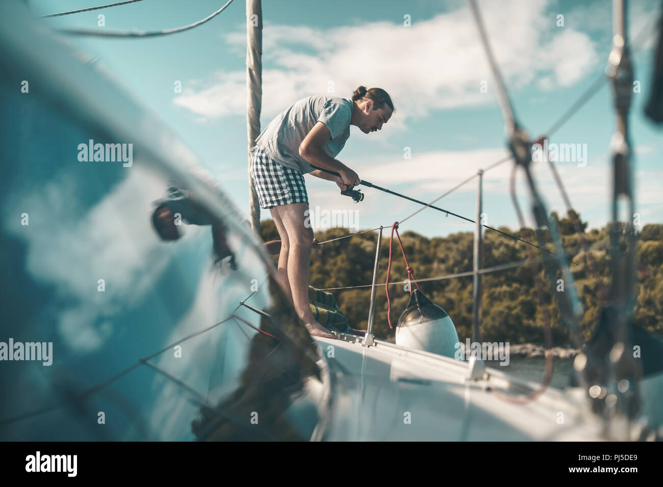 Sailing Boat action Stock Photo - Alamy