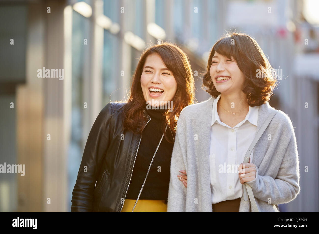 Japanese women window shopping downtown Tokyo Stock Photo - Alamy