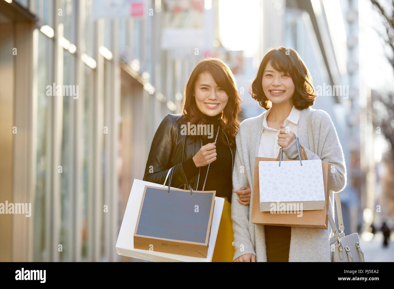 Japanese women window shopping downtown Tokyo Stock Photo - Alamy