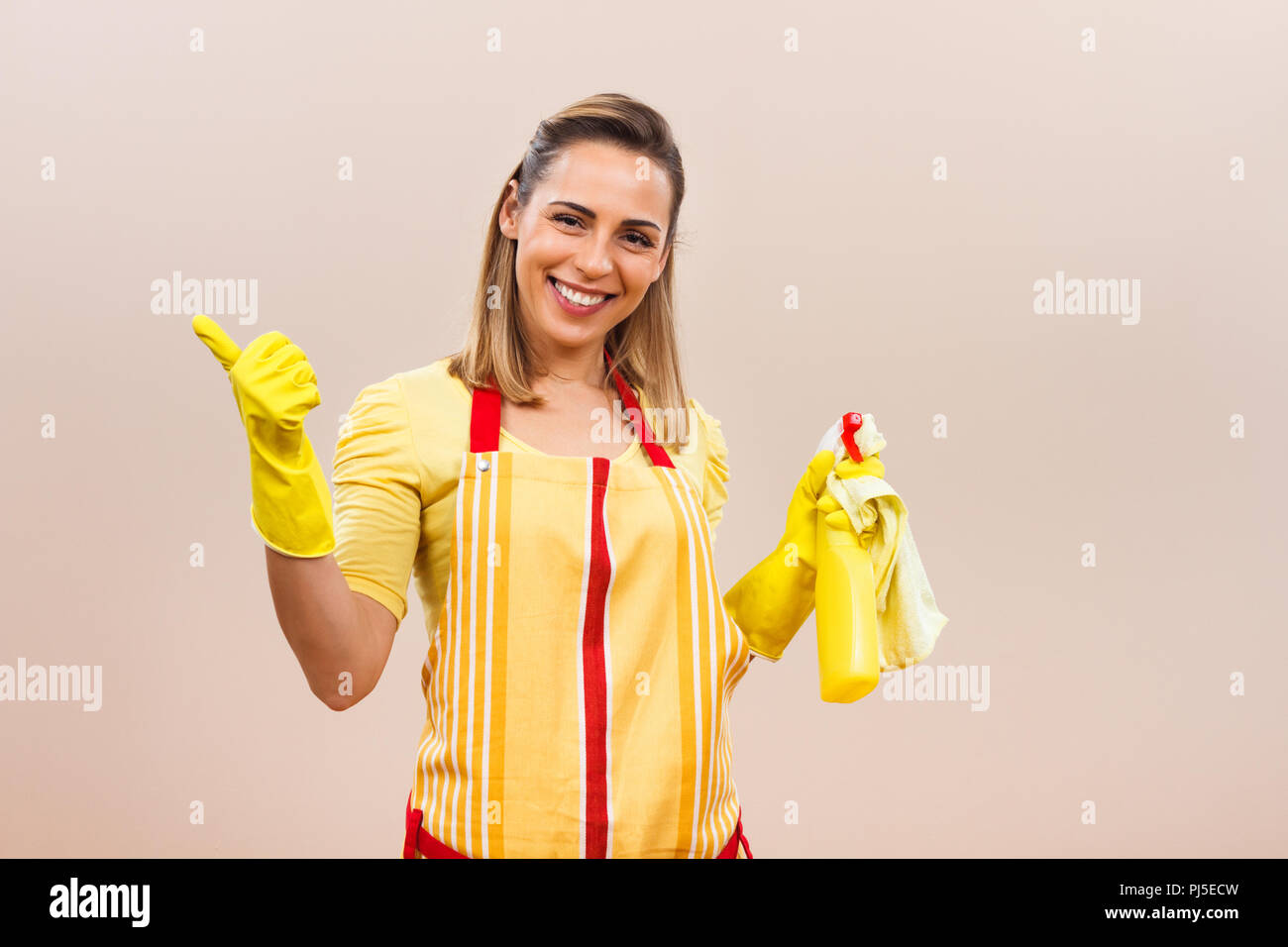 Thumbs up for cleaning Stock Photo - Alamy