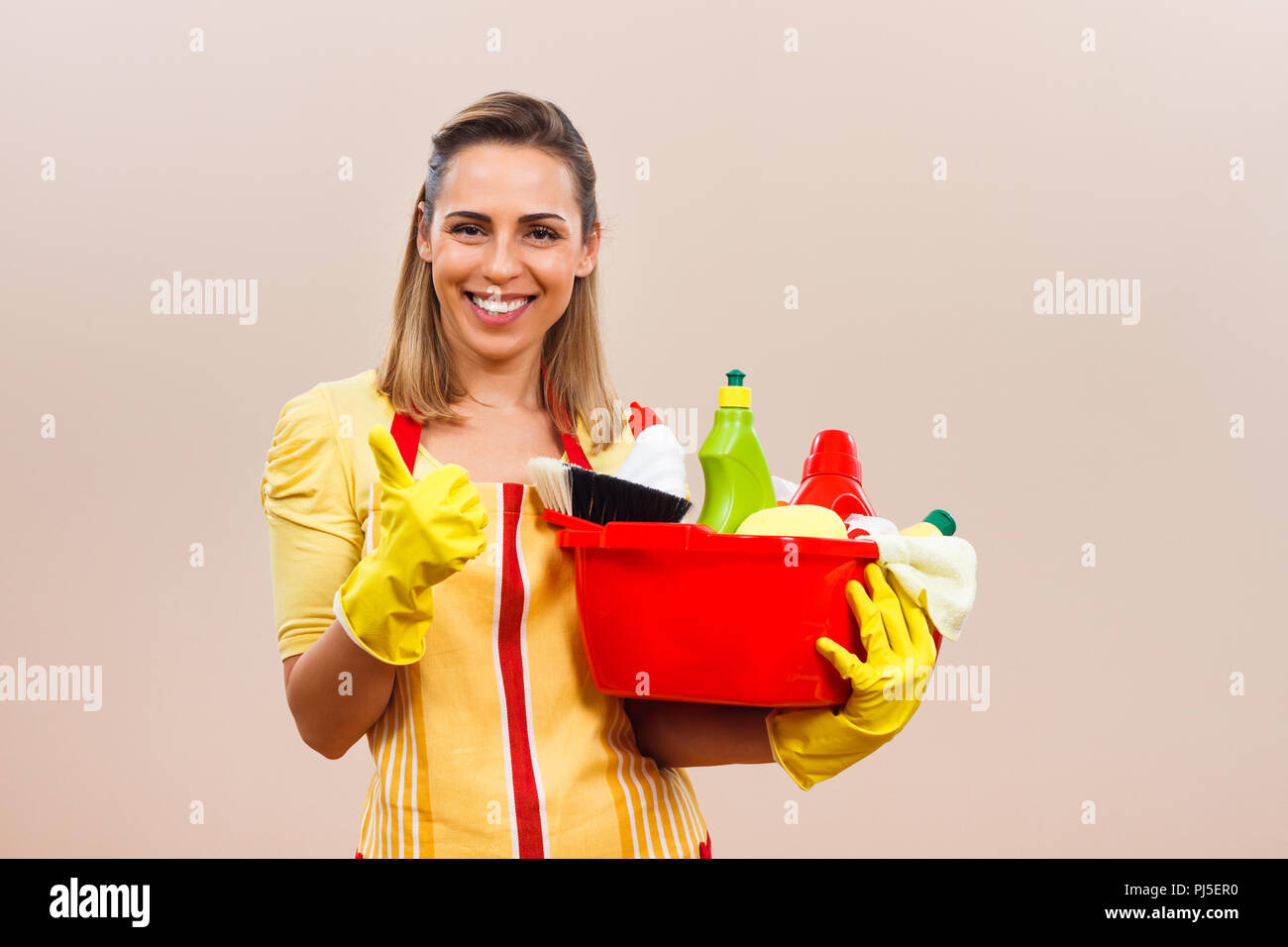 Thumbs up for cleaning Stock Photo - Alamy