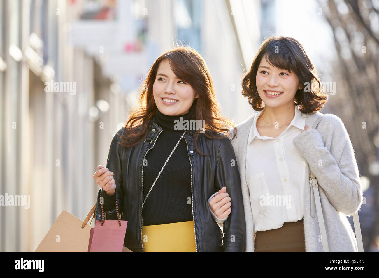 Japanese women window shopping downtown Tokyo Stock Photo - Alamy