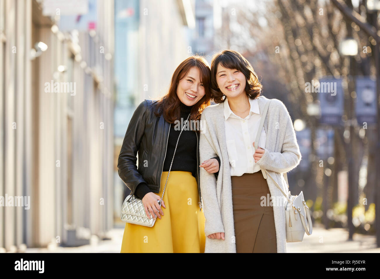 Japanese women window shopping downtown Tokyo Stock Photo - Alamy