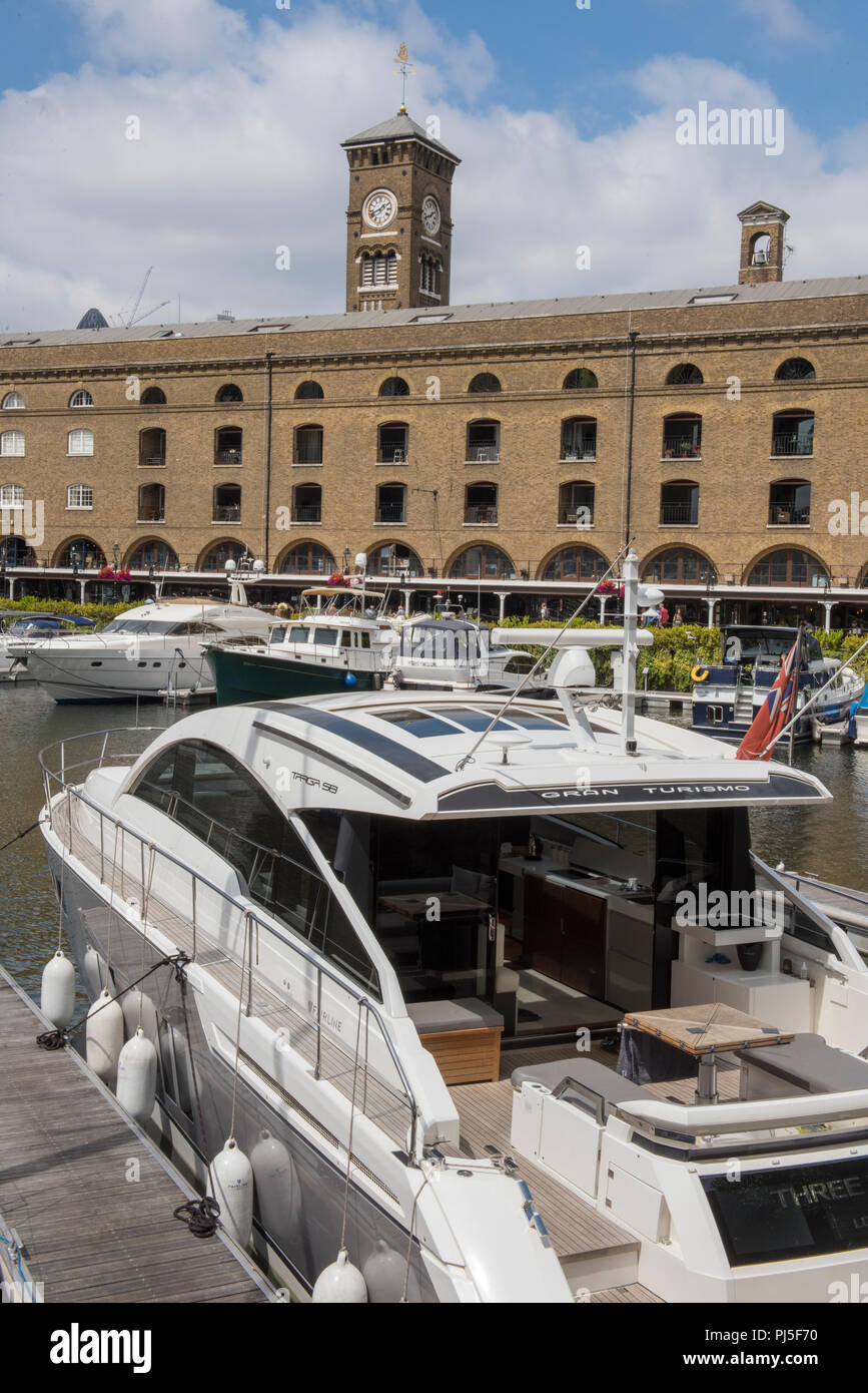 large motorboat or motor yacht moored on a jetty at st Katherine docks ...