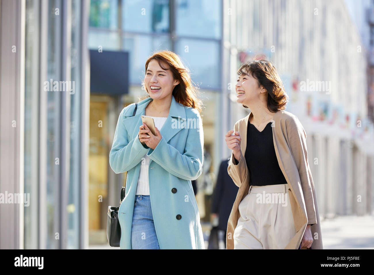 Japanese women window shopping downtown Tokyo Stock Photo - Alamy