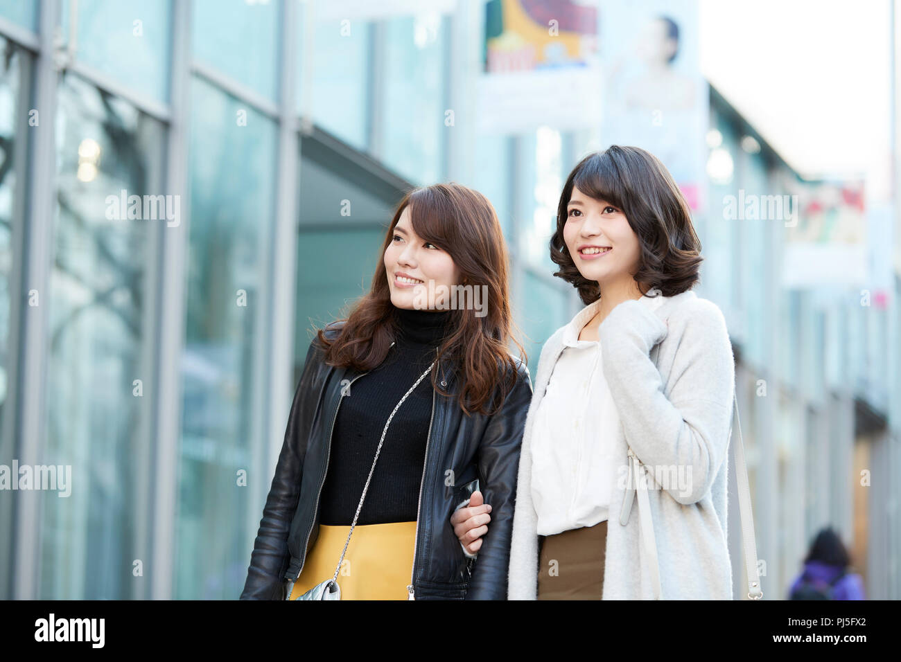Japanese women window shopping downtown Tokyo Stock Photo - Alamy