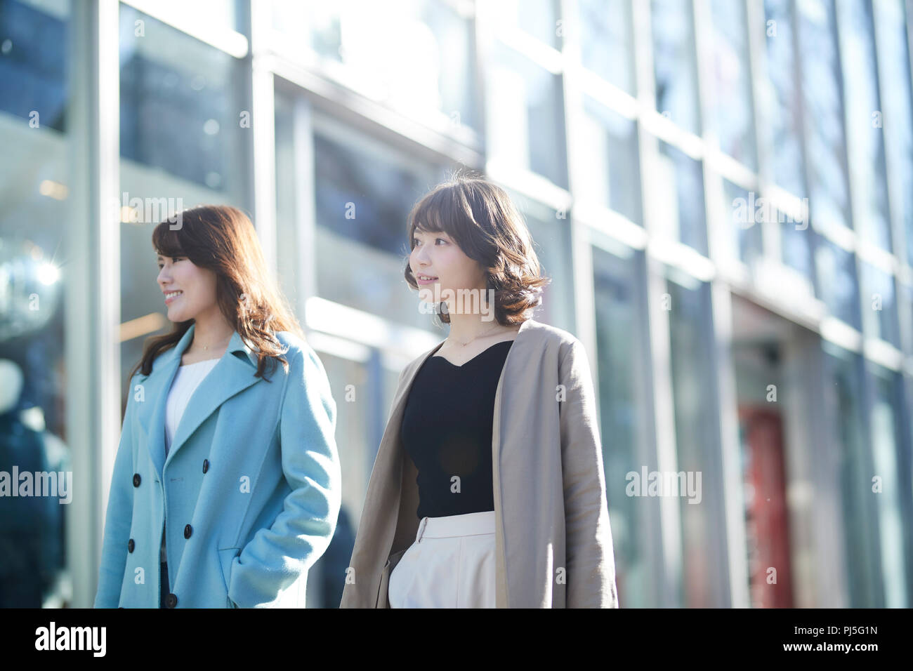 Japanese women window shopping downtown Tokyo Stock Photo - Alamy