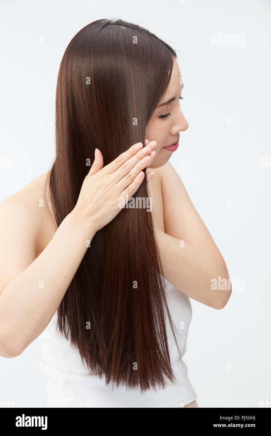Japanese woman with silky hair Stock Photo - Alamy