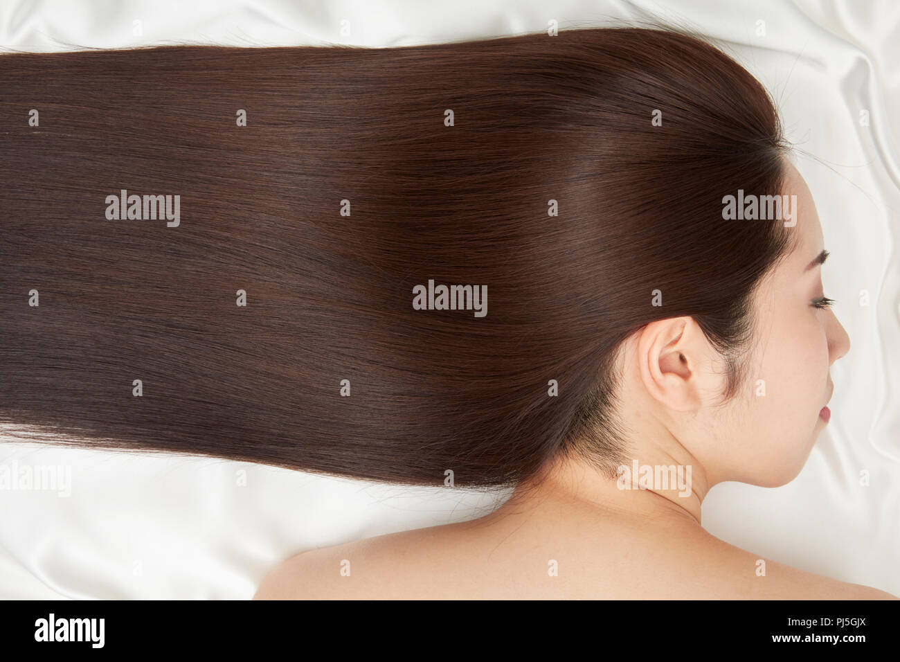 Japanese woman with silky hair Stock Photo - Alamy