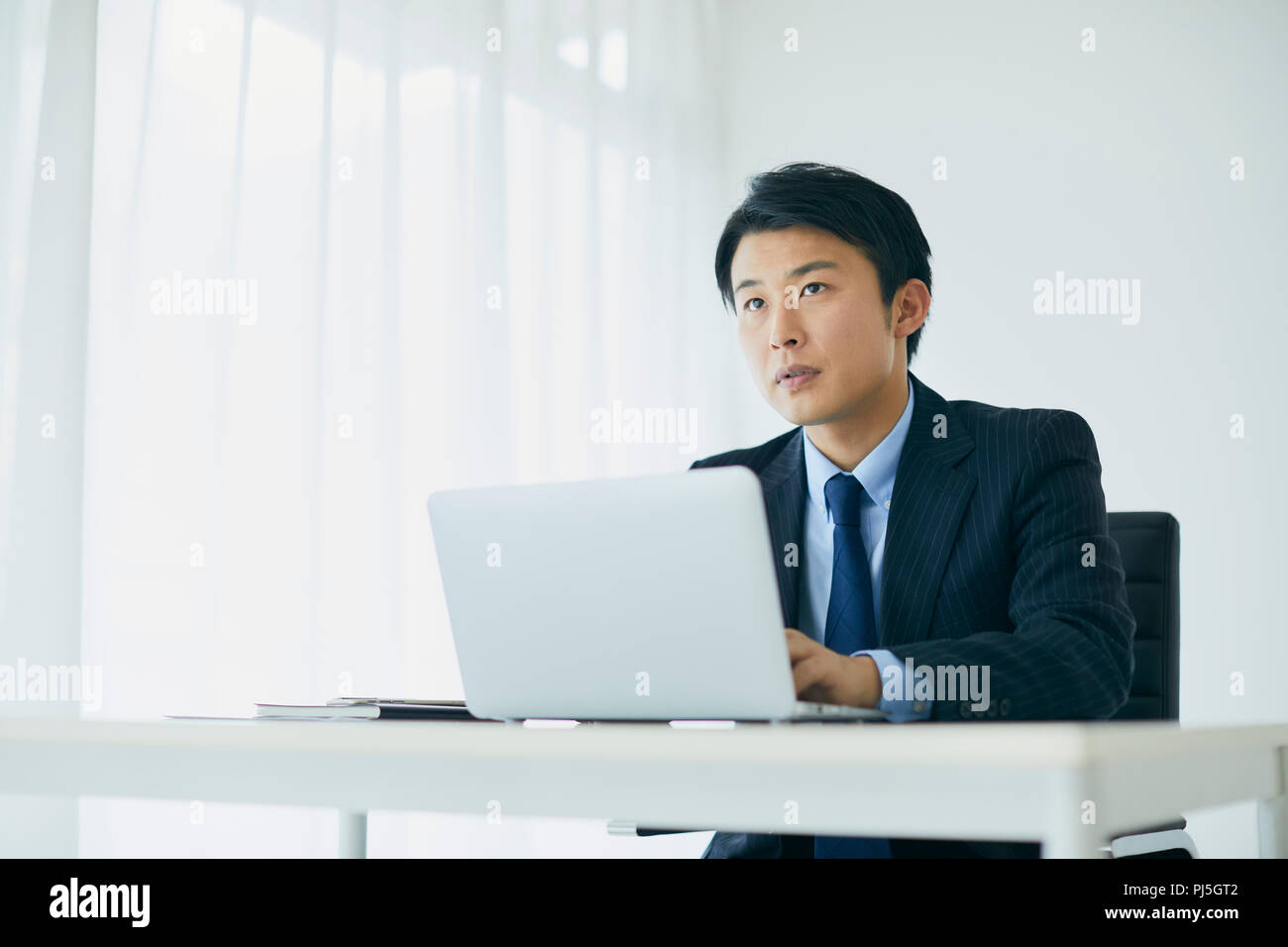 Japanese businessman in the office Stock Photo - Alamy