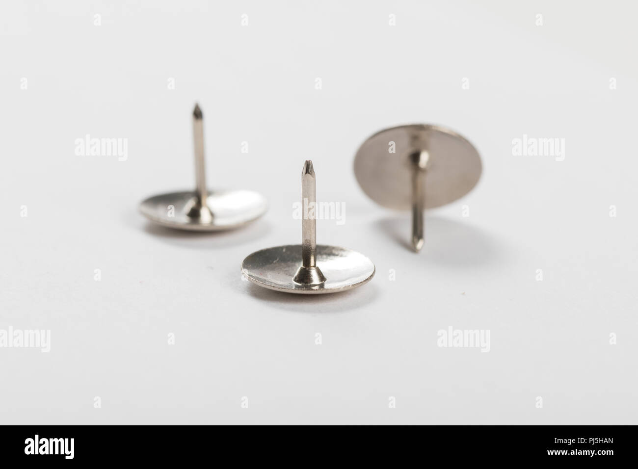Group Of Metal Thumb Tacks for background Stock Photo - Alamy