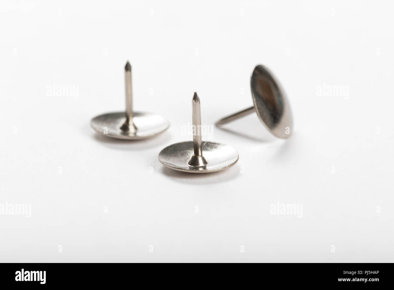 Group Of Metal Thumb Tacks for background Stock Photo - Alamy
