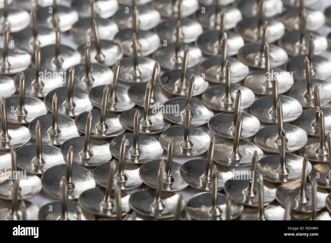 Group Of Metal Thumb Tacks for background Stock Photo - Alamy
