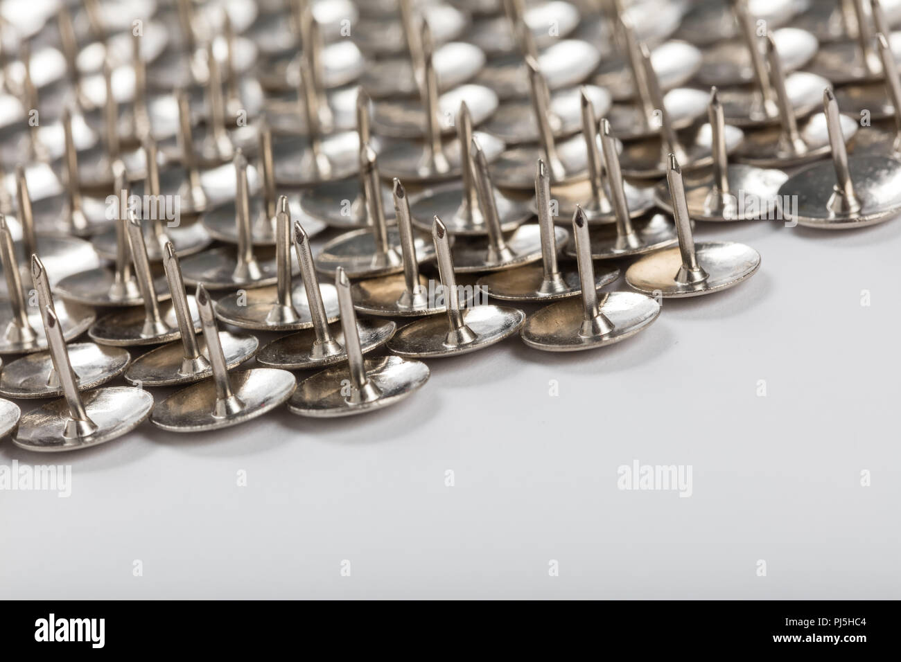 Group Of Metal Thumb Tacks for background Stock Photo - Alamy