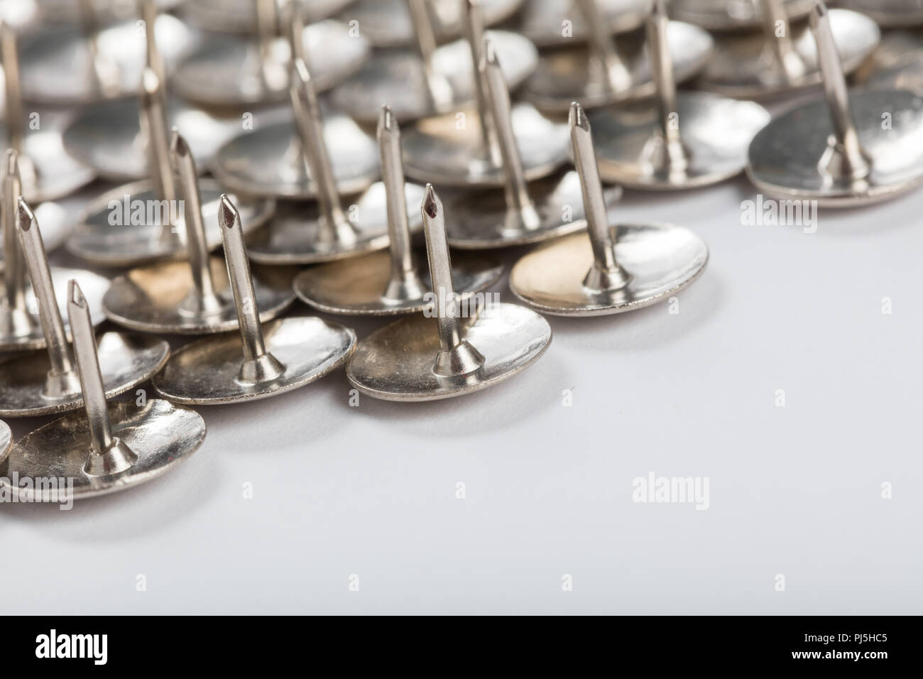 Group Of Metal Thumb Tacks for background Stock Photo - Alamy