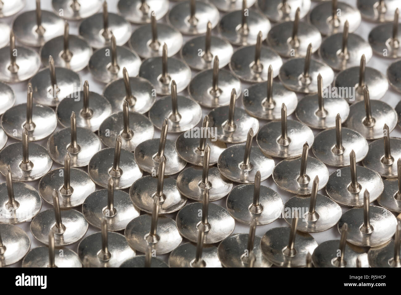Group Of Metal Thumb Tacks for background Stock Photo - Alamy