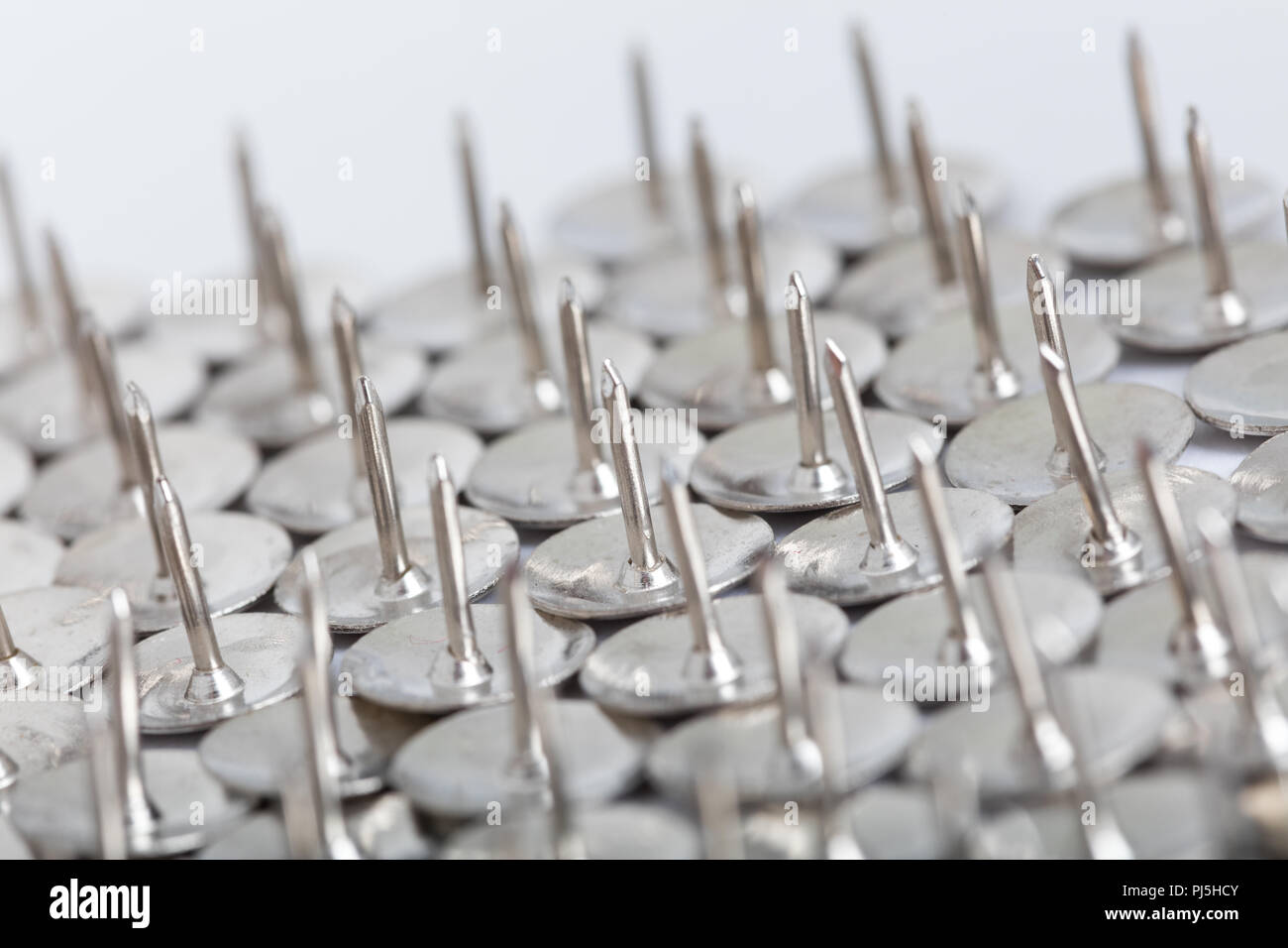 Group Of Metal Thumb Tacks for background Stock Photo - Alamy