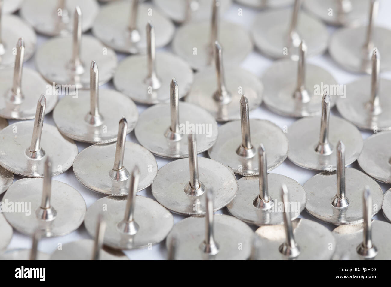Group Of Metal Thumb Tacks for background Stock Photo - Alamy