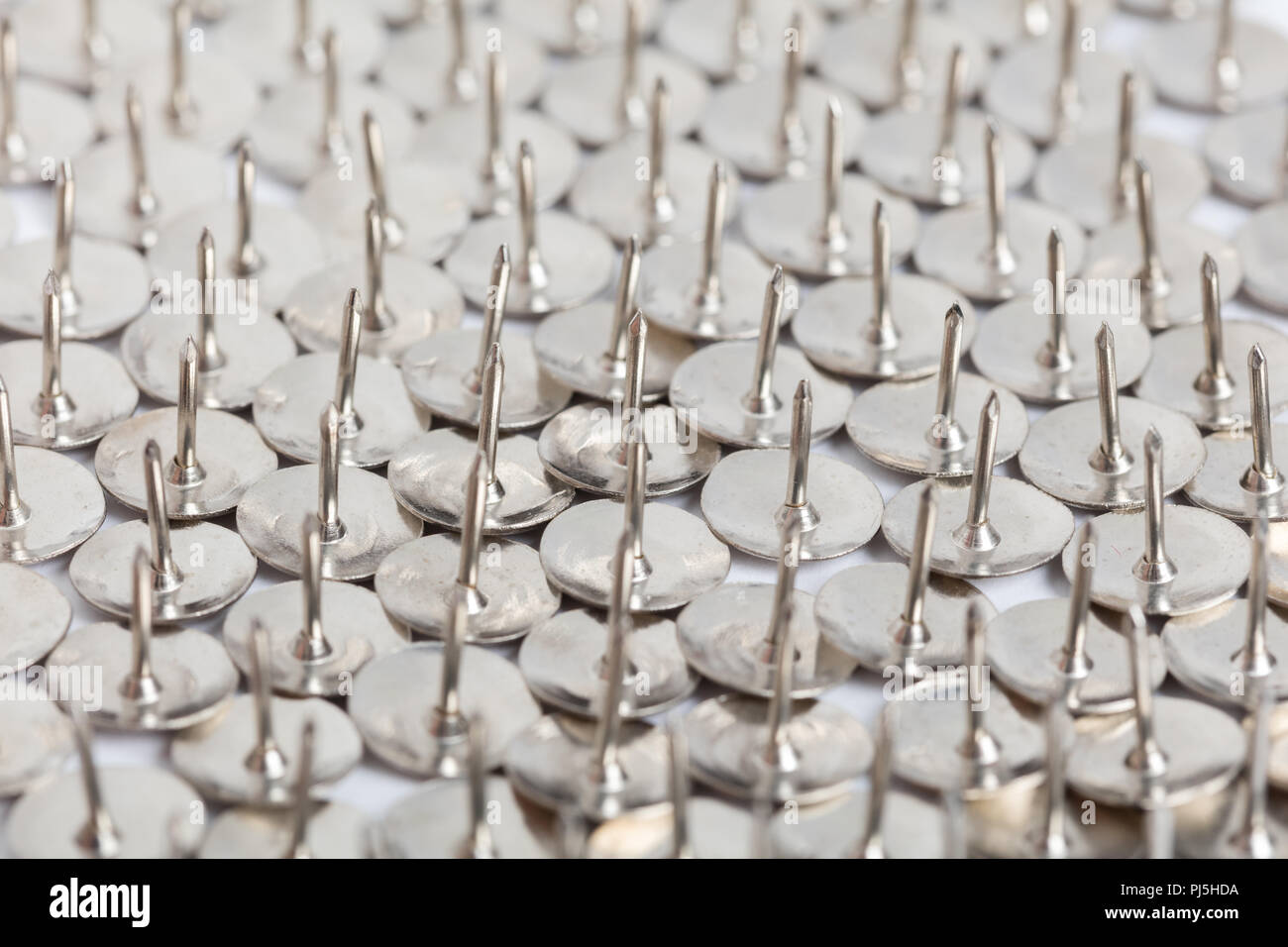 Group Of Metal Thumb Tacks for background Stock Photo - Alamy