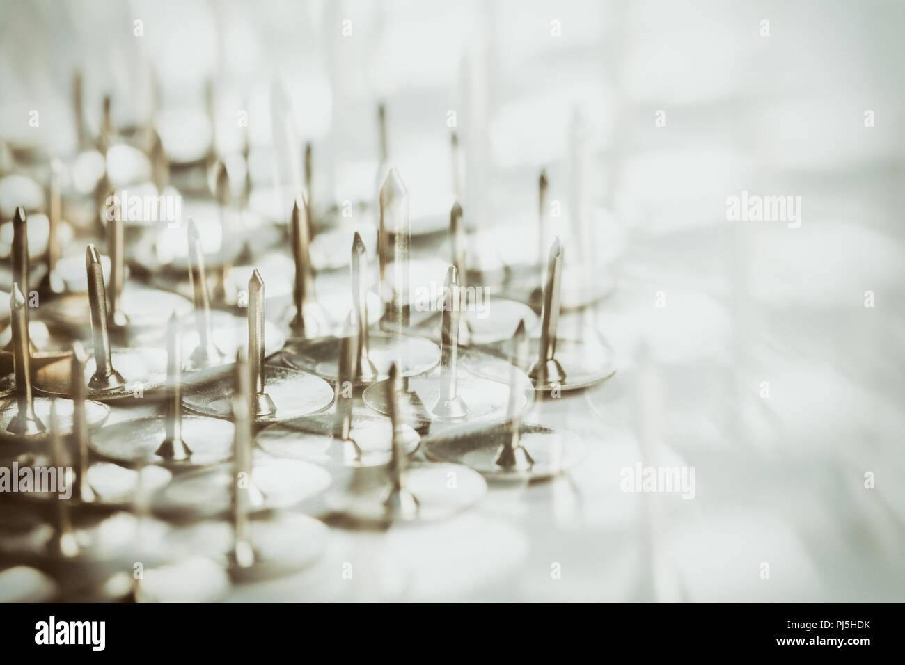 Group Of Metal Thumb Tacks for background Stock Photo - Alamy